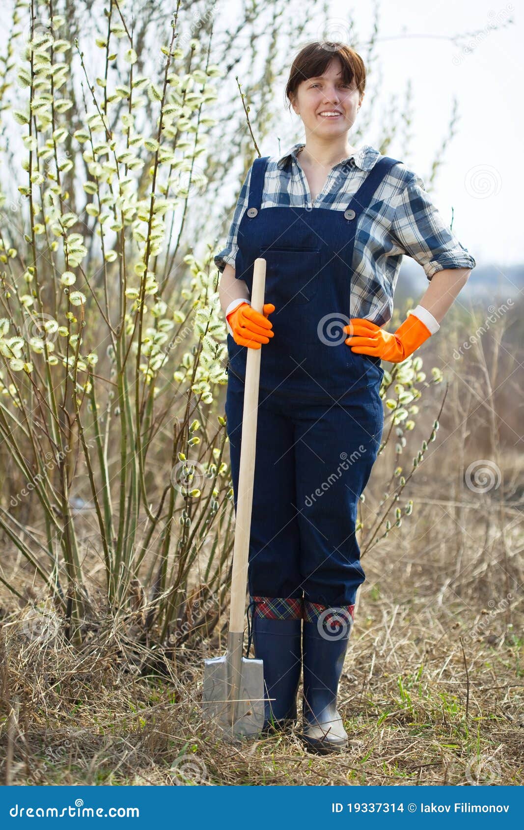 Female farmer with spade stock photo. Image of romper - 19337314