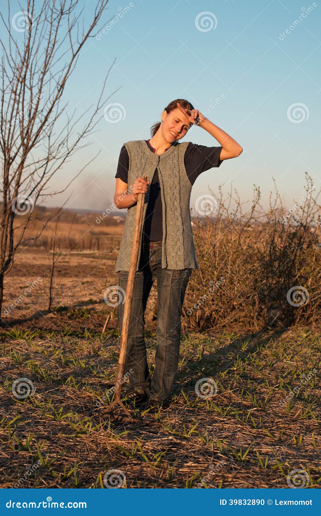 Female farmer with spade stock photo. Image of garden - 39832890