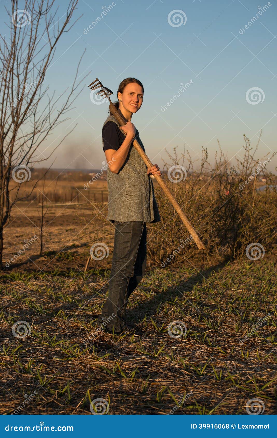 Female farmer with spade stock photo. Image of garden - 39916068