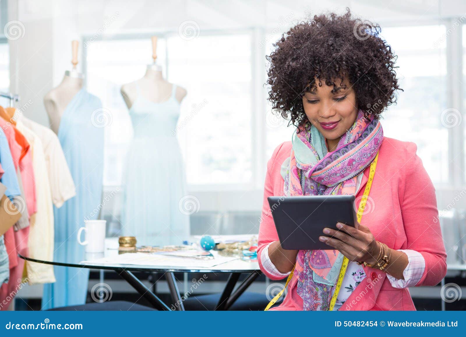 Female Fashion Designer Using Digital Tablet Stock Photo - Image of ...