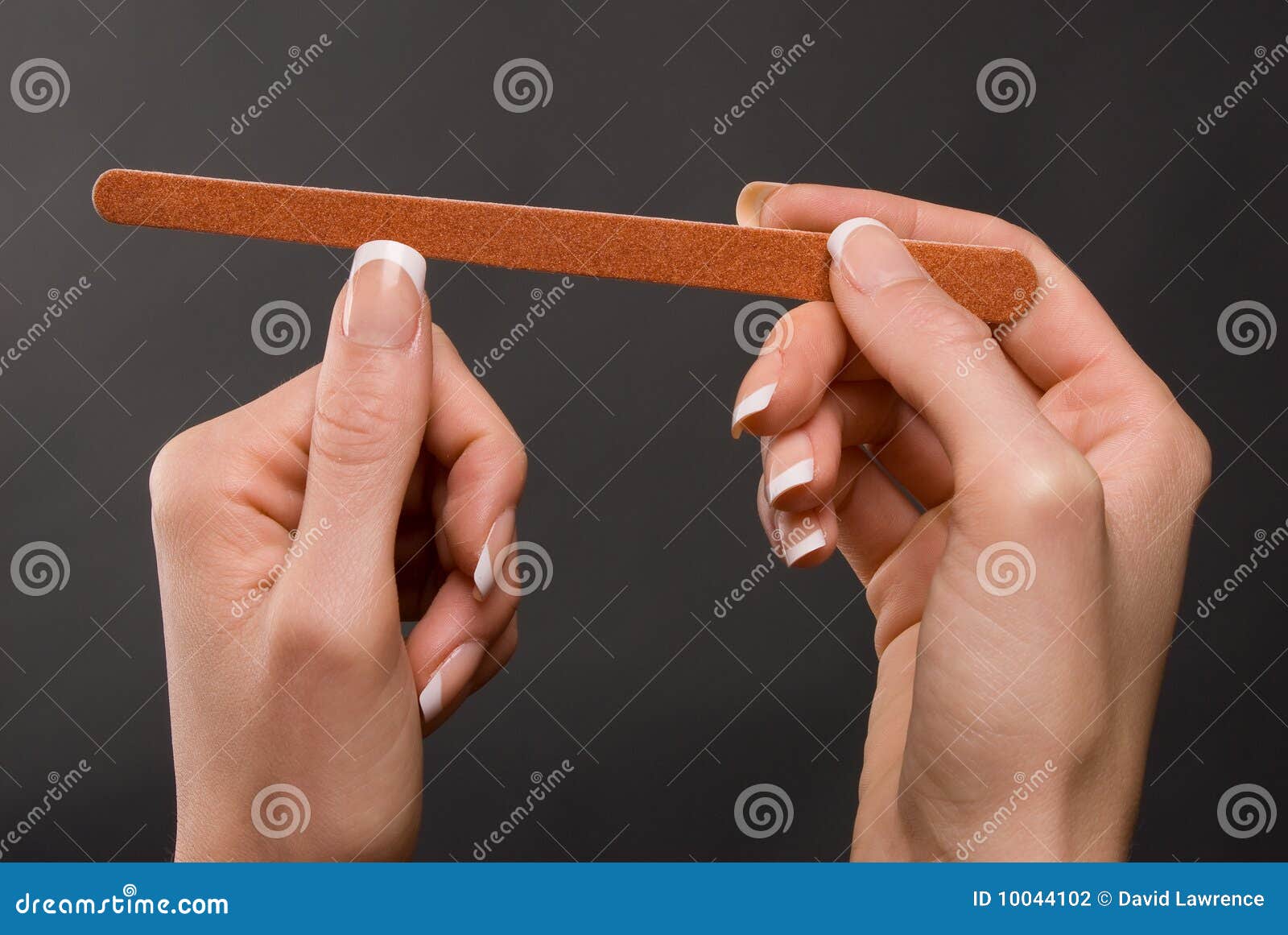 Female filing nails stock photo. Image of hands, woman - 10044102