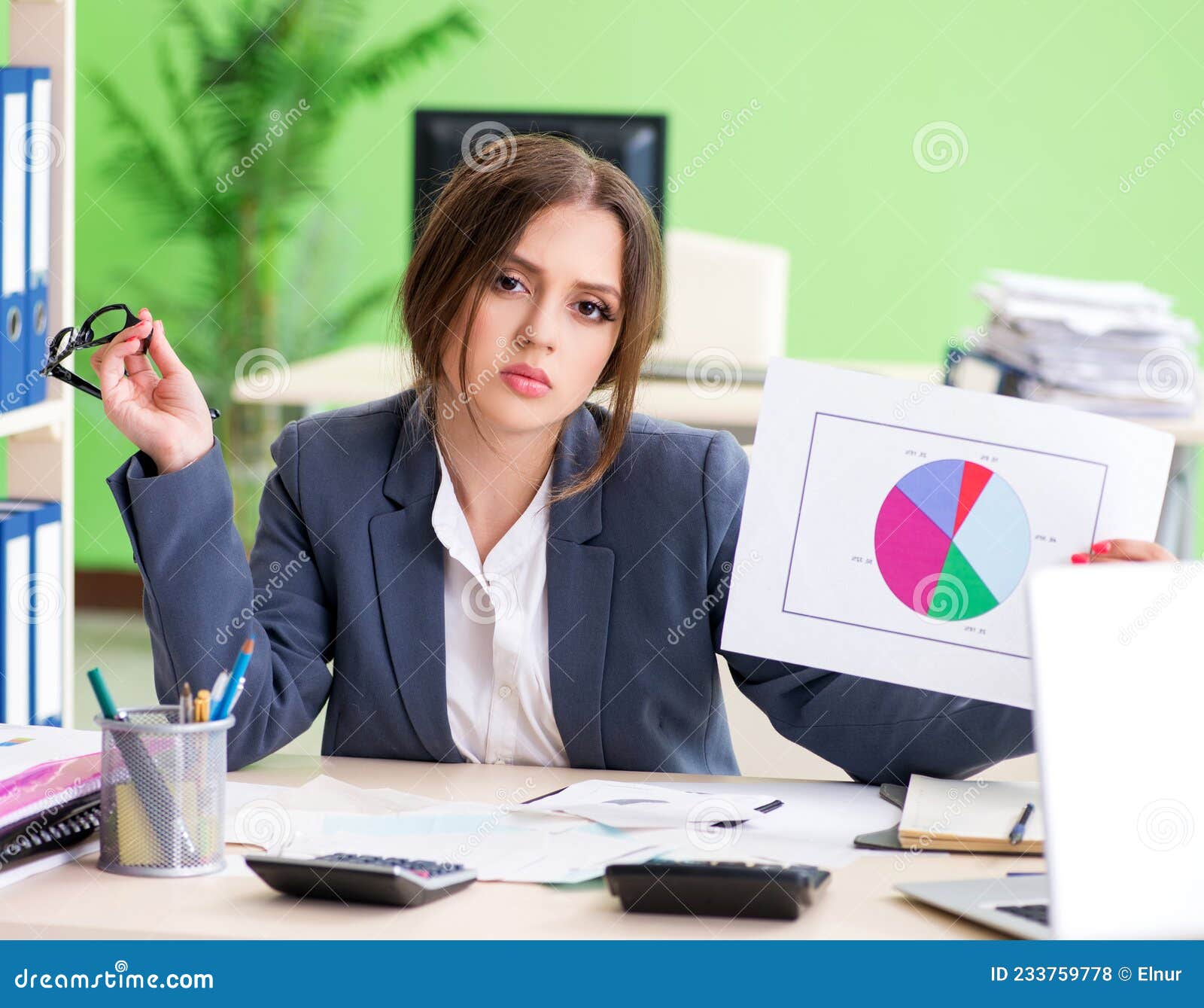 Female Financial Manager Presenting Graph Chart Sitting in the O Stock ...