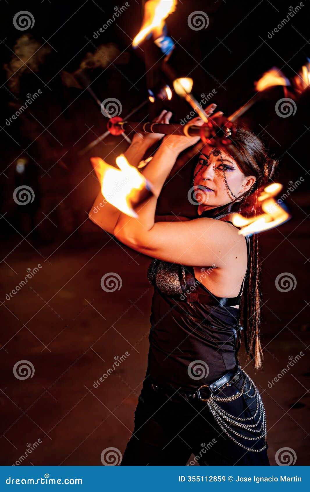 Fire Performer Juggling Burning Torches in the Dark Stock Image - Image ...