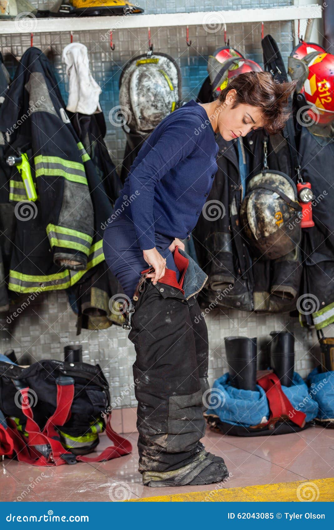 Female Firefighter Wearing Uniform at Fire Station Stock Image - Image ...