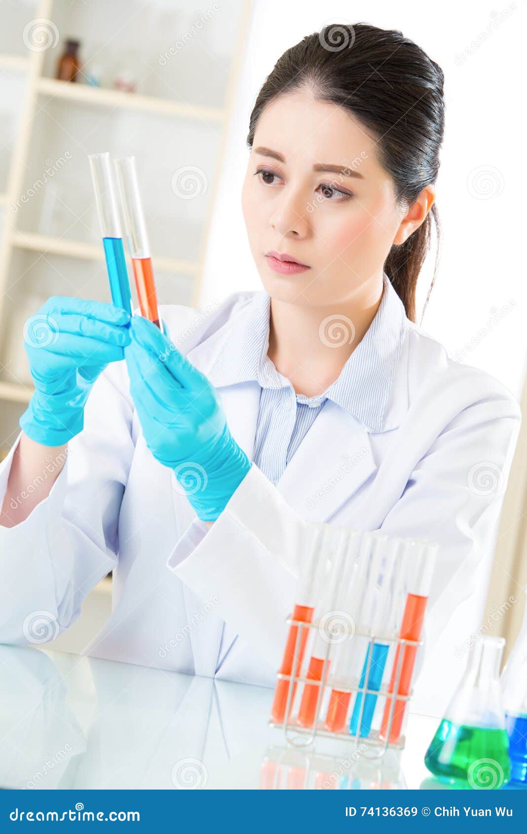 Female Forensic Scientist Working on Chemicals in Laboratory Stock ...
