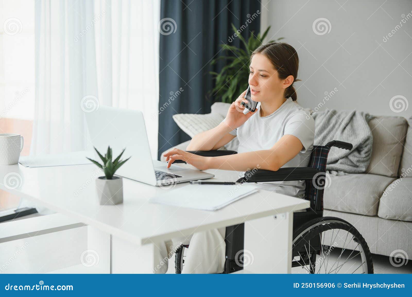 Female Freelance Programmer Sitting in Wheelchair and Using Computers ...