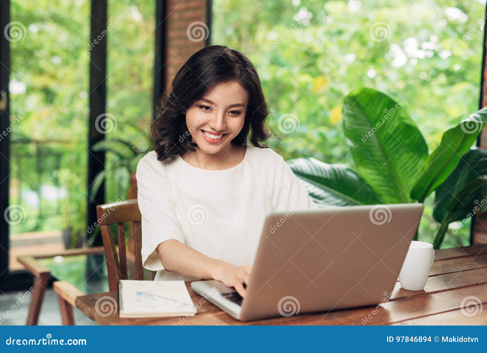 Female Freelancer Working in Coffee Shop. Student Learning Online Stock ...