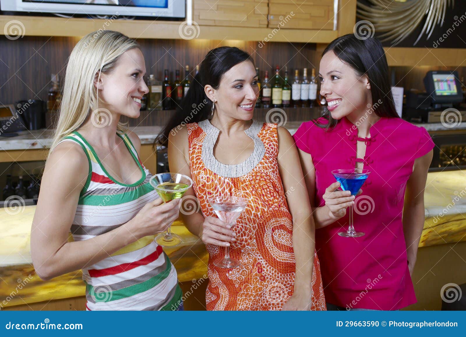 Female Friends with Drinks at Bar Stock Photo - Image of mixed ...