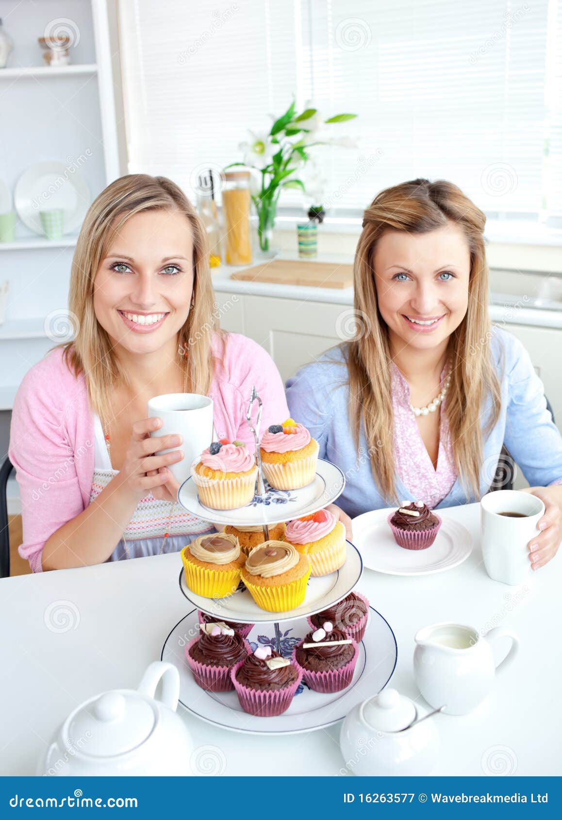 Female Friends Eating Pastries and Drinking Coffee Stock Image - Image ...