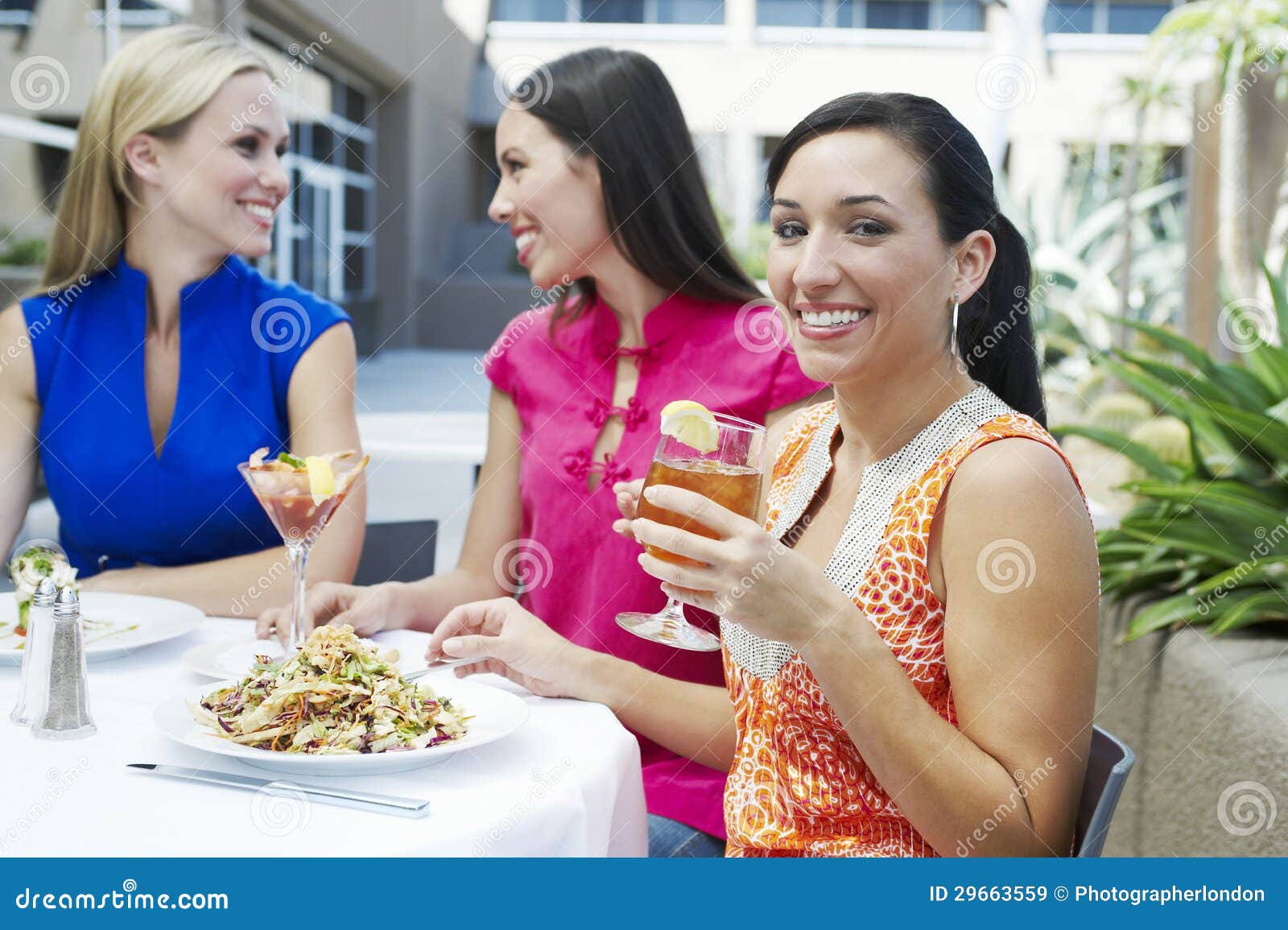 Female Friends Enjoying at a Restaurant Stock Image - Image of female ...