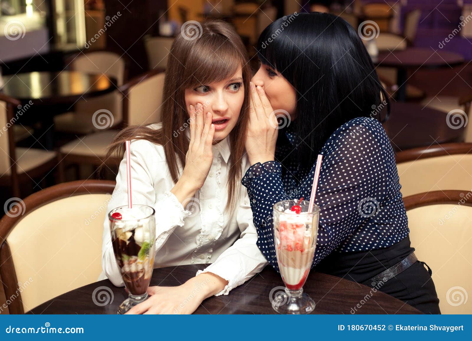Friends gossiping in cafe stock photo. Image of brunette - 180670452