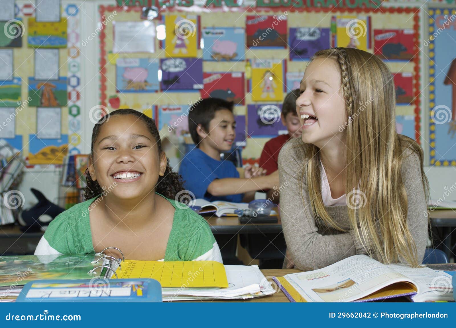 Female Friends Laughing in the Classroom Stock Photo - Image of ...