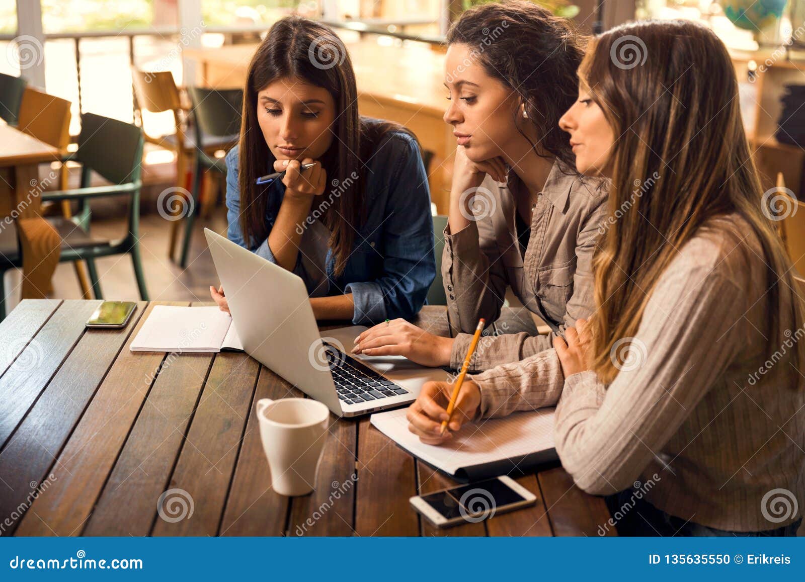 Female Friends Studying Together Stock Photo - Image of shop, hangout ...