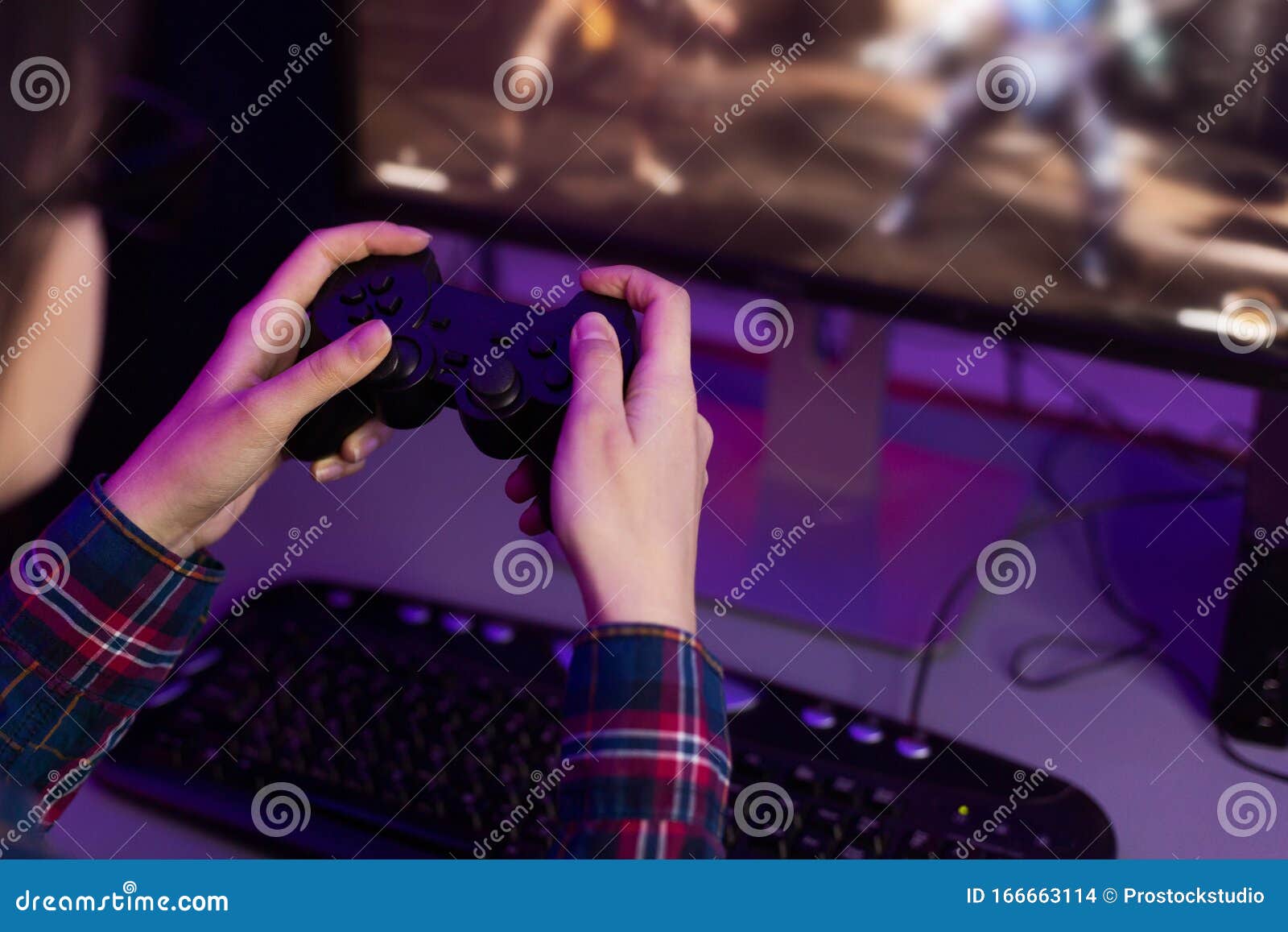 Female Gamer Holding Joystick and Playing Video Game Stock Photo ...