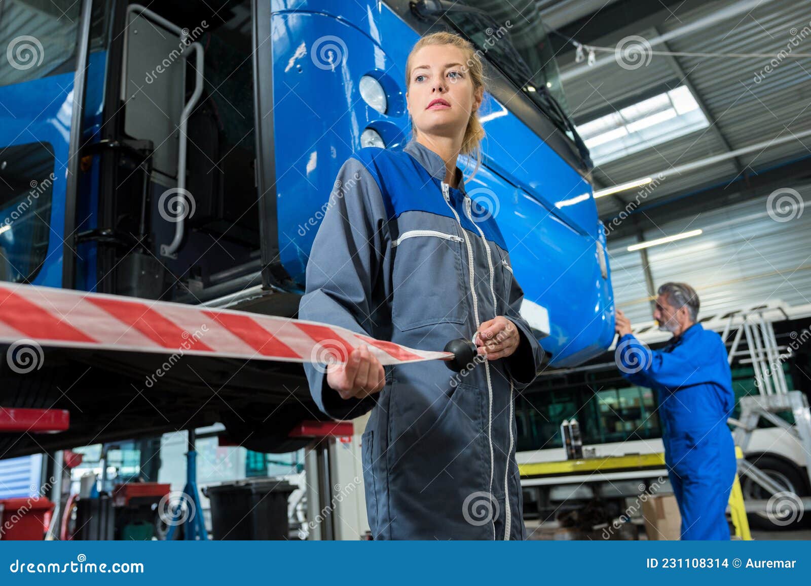 Female Garage Worker with Heavy Equipment Stock Photo - Image of heavy ...
