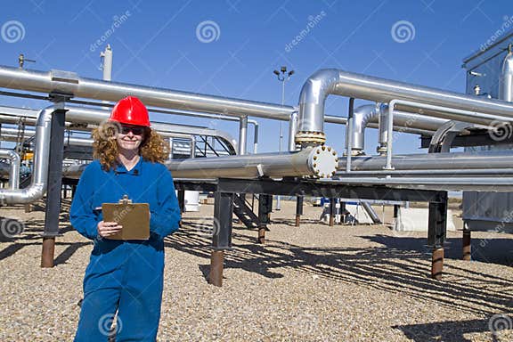 Female Gas Field Operator Inspects Compressor Site Stock Photo - Image ...