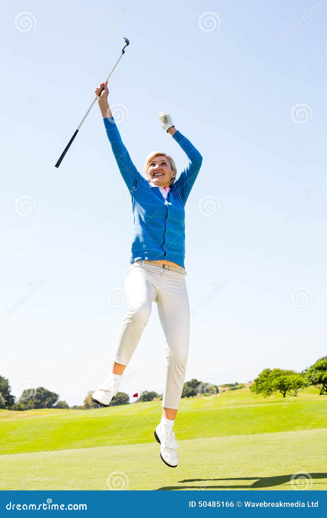 Female Golfer Leaping and Cheering Stock Photo - Image of happy ...