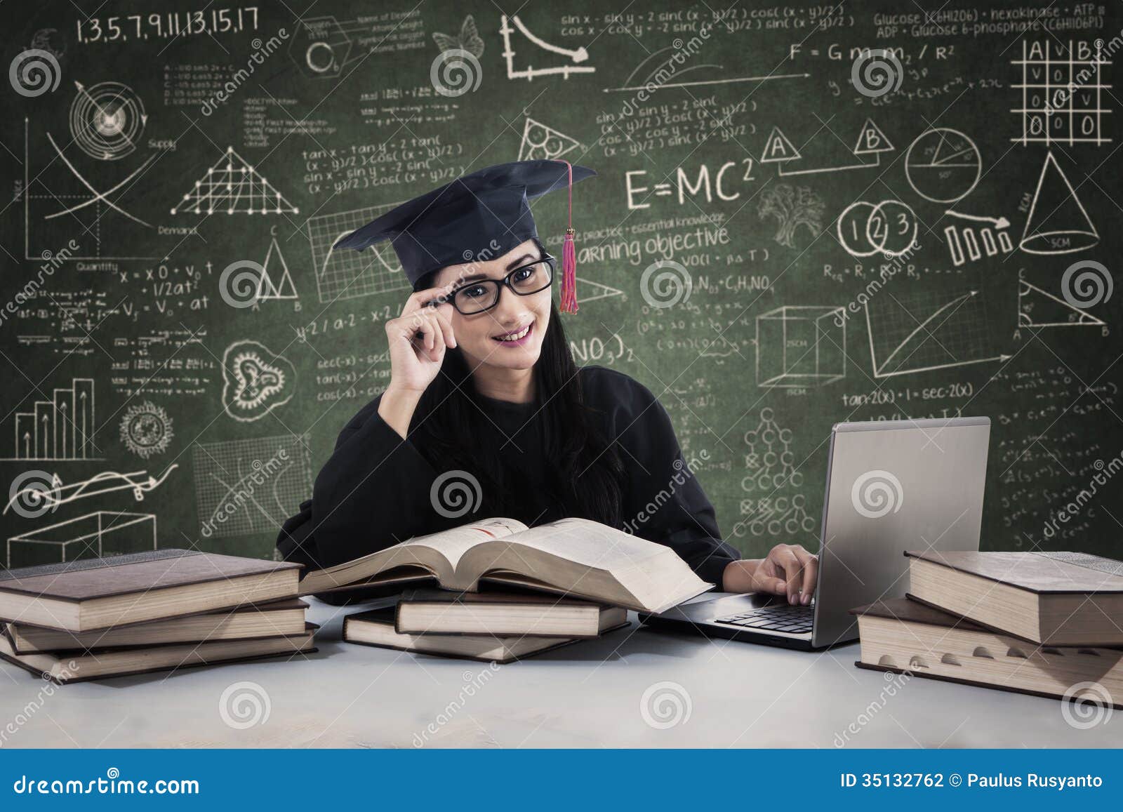 Female Graduate Learning with Laptop Stock Photo - Image of classroom ...
