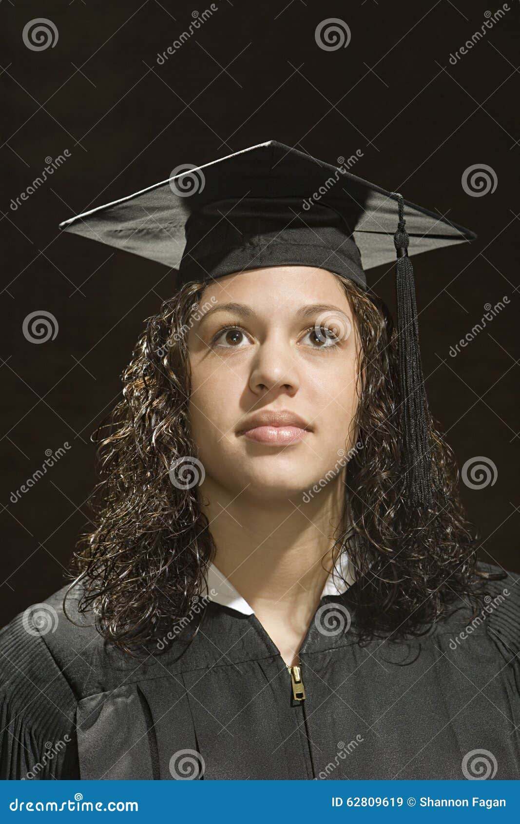 Female graduate looking up stock image. Image of academics - 62809619