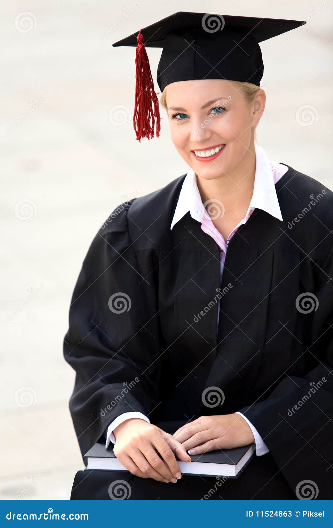 Female graduate smiling stock image. Image of sitting - 11524863