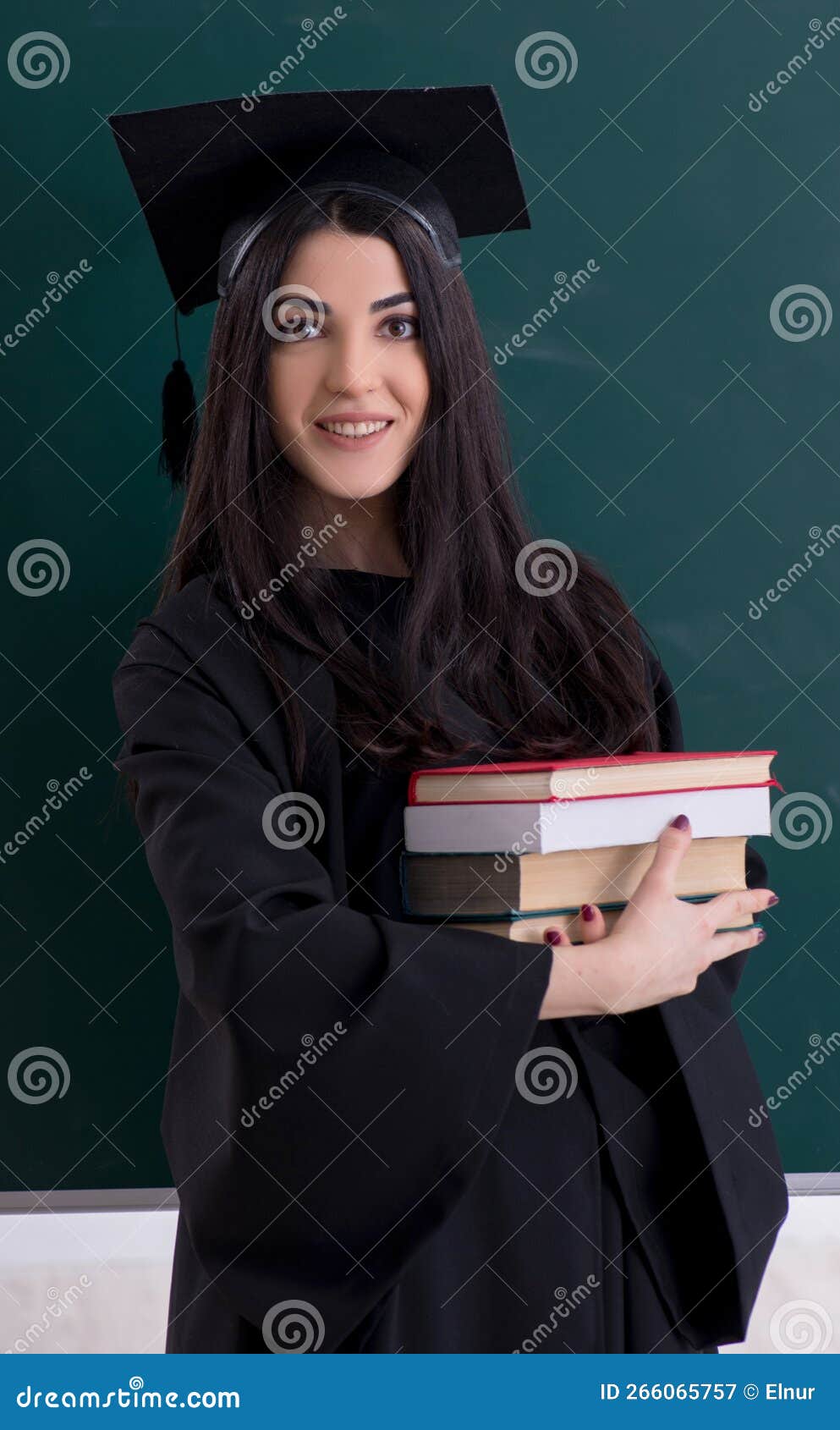 Female Graduate Student in Front of Green Board Stock Image - Image of ...