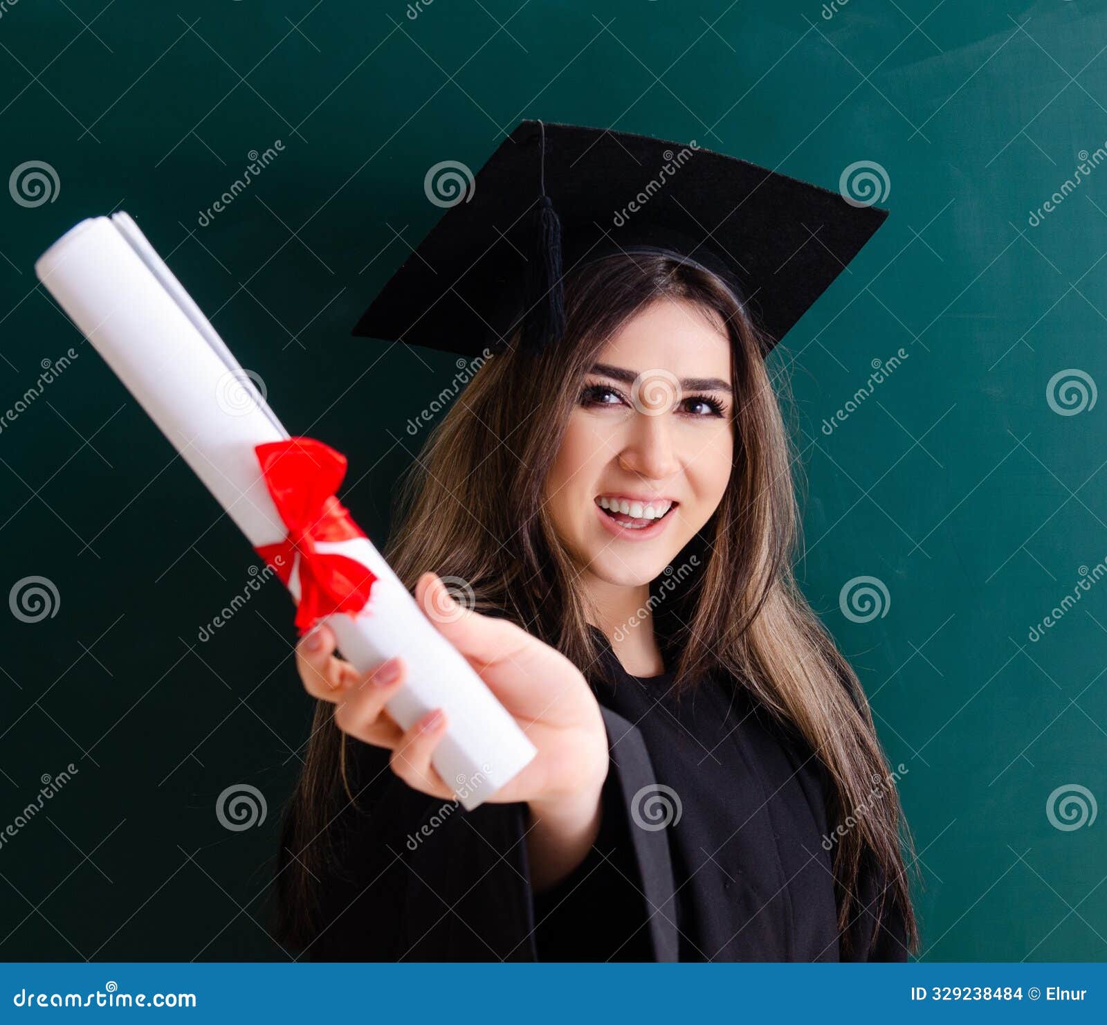Female Graduate Student in Front of Green Board Stock Photo - Image of ...