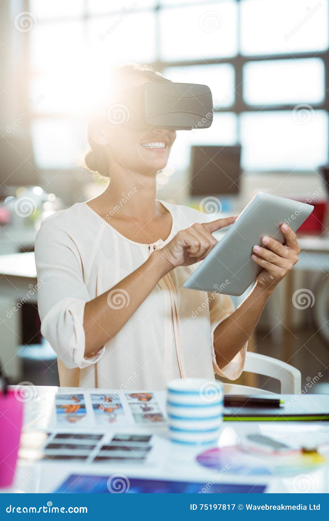 Female Graphic Designer in Virtual Reality Headset Using Digital Tablet ...