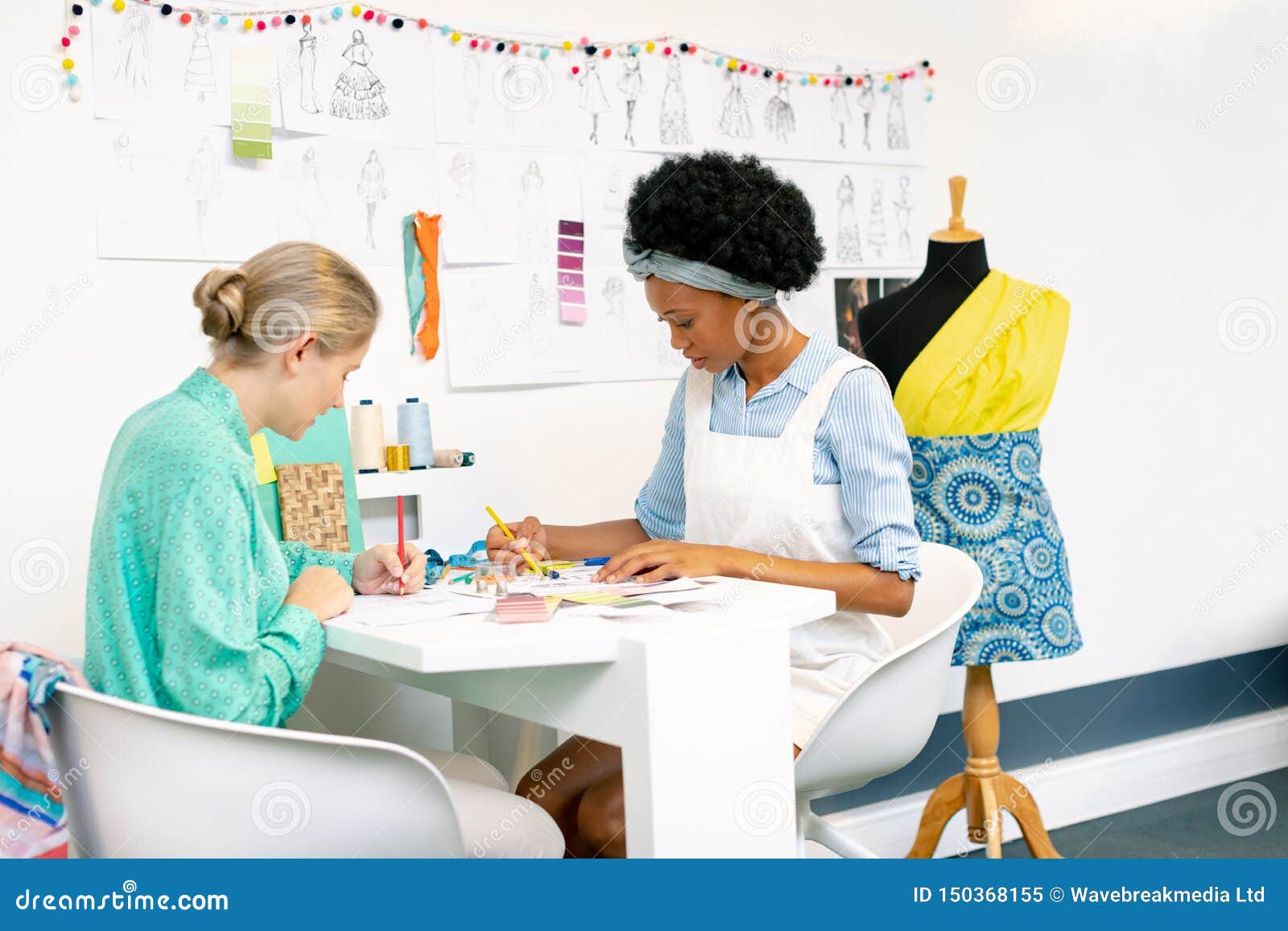 Female Graphic Designers Drawing Sketch in Office Stock Image - Image ...