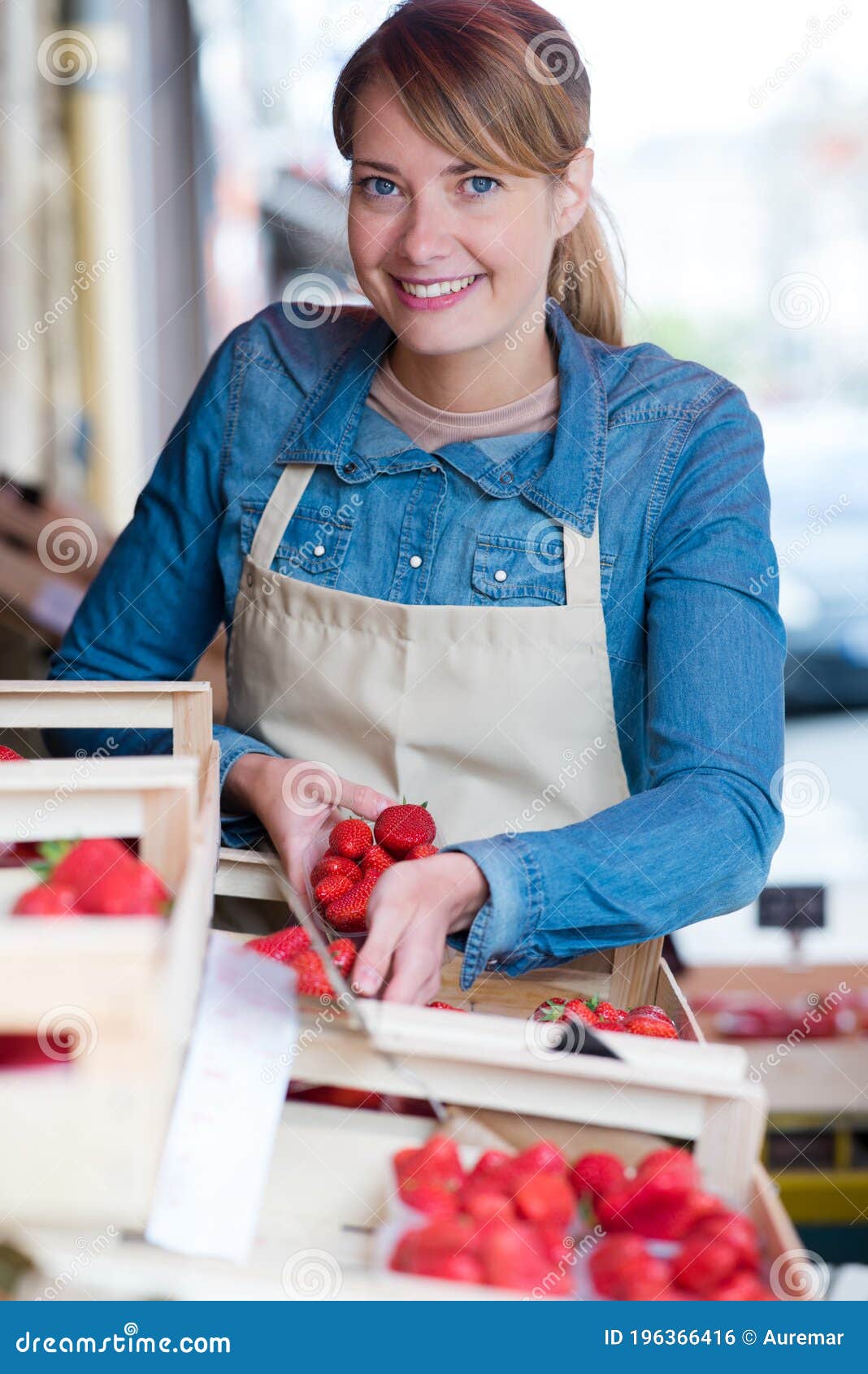 Female Grocer Unpacking Crates Strawberries Stock Photo - Image of ...