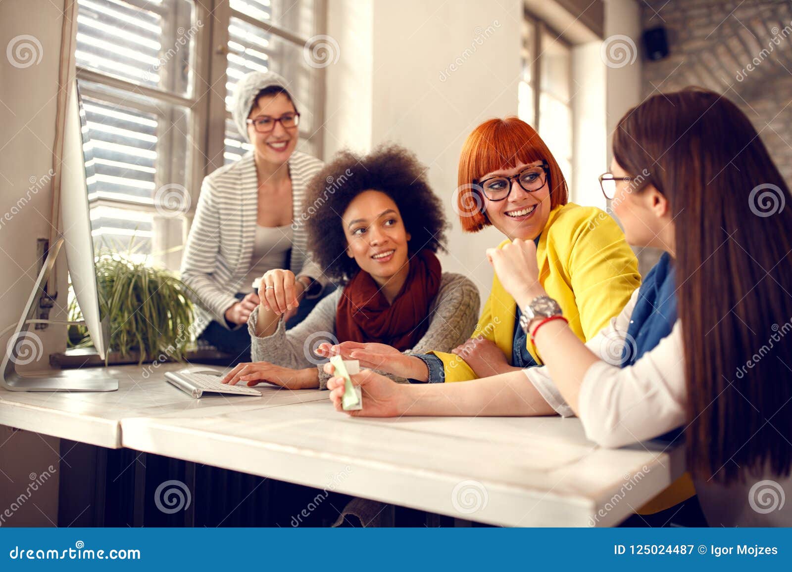 Female Group Talking and Working Together in Office Stock Image - Image ...
