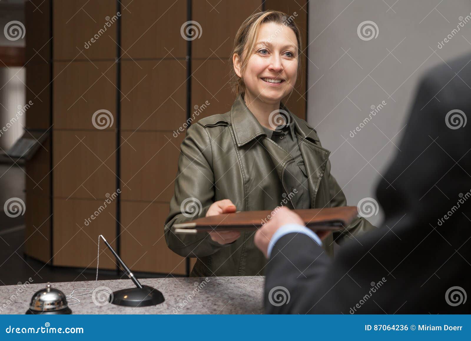 Female guest in a hotel stock photo. Image of suit, office - 87064236