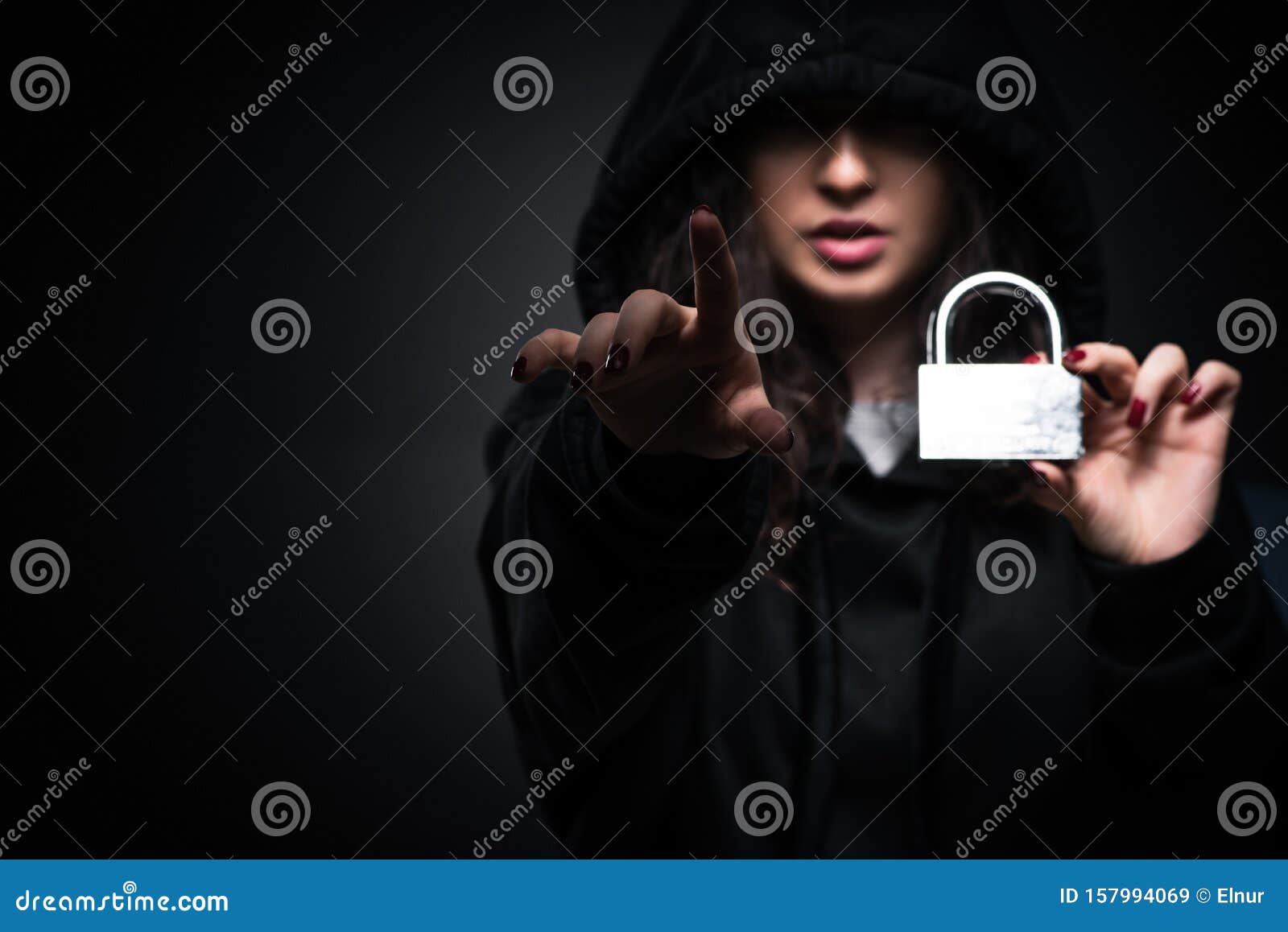 Female Hacker Sitting In The Dark With His Laptop And Tries To Crack ...