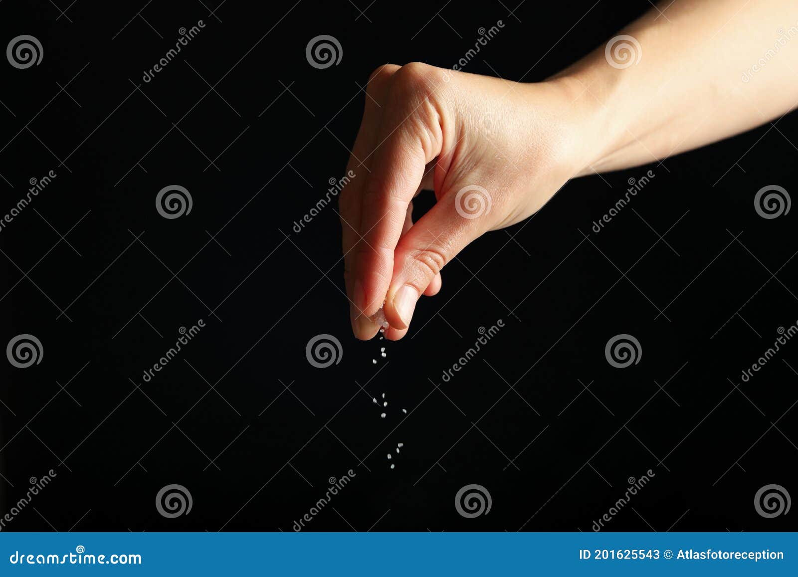 Female Hand Adding Salt on Black Background Stock Image - Image of hold ...