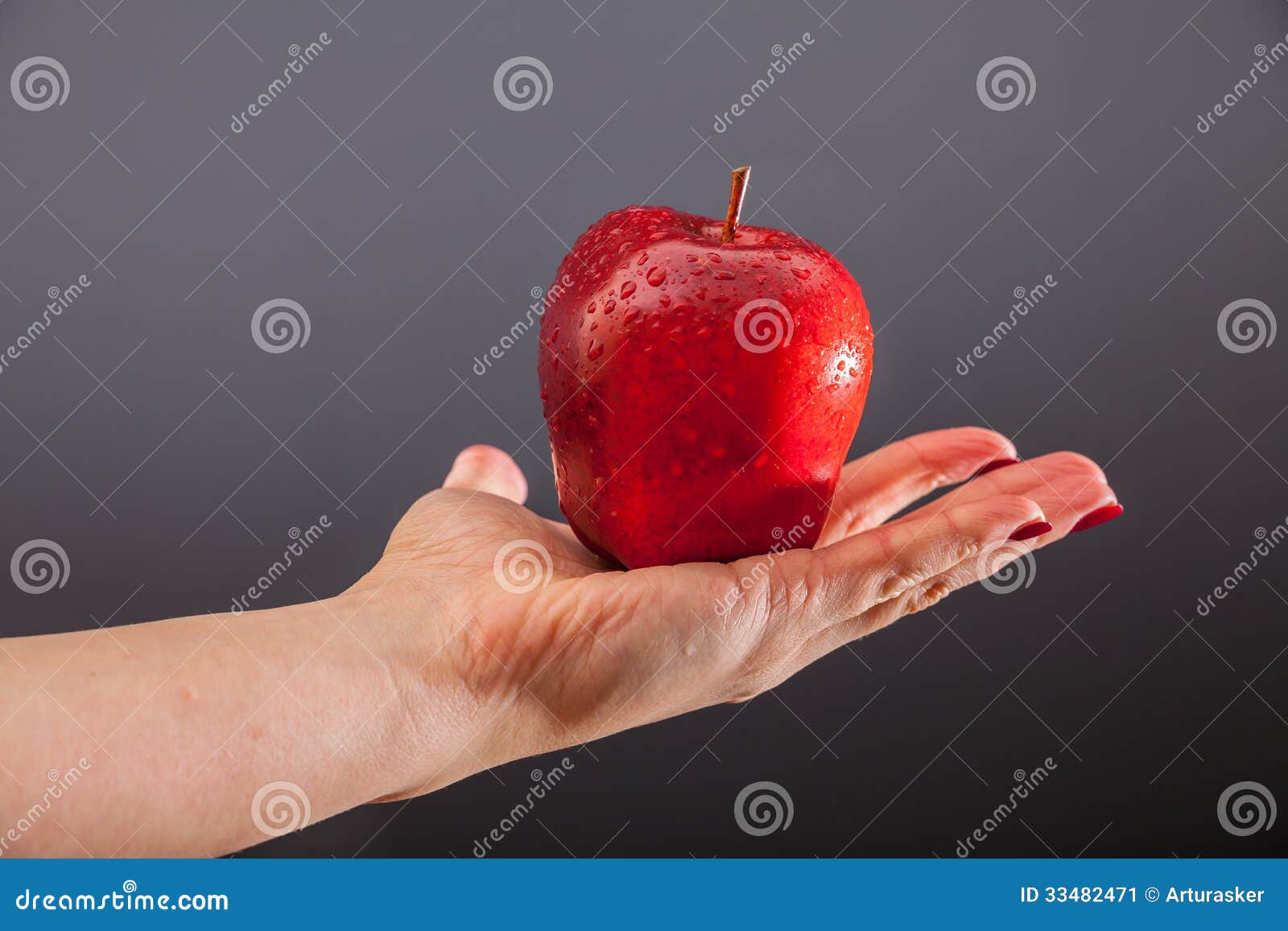 Female hand with an apple stock image. Image of nonverbal - 33482471