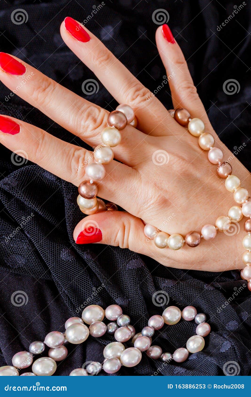Female Hand with Beauty Pearls Stock Image - Image of fashion, female ...