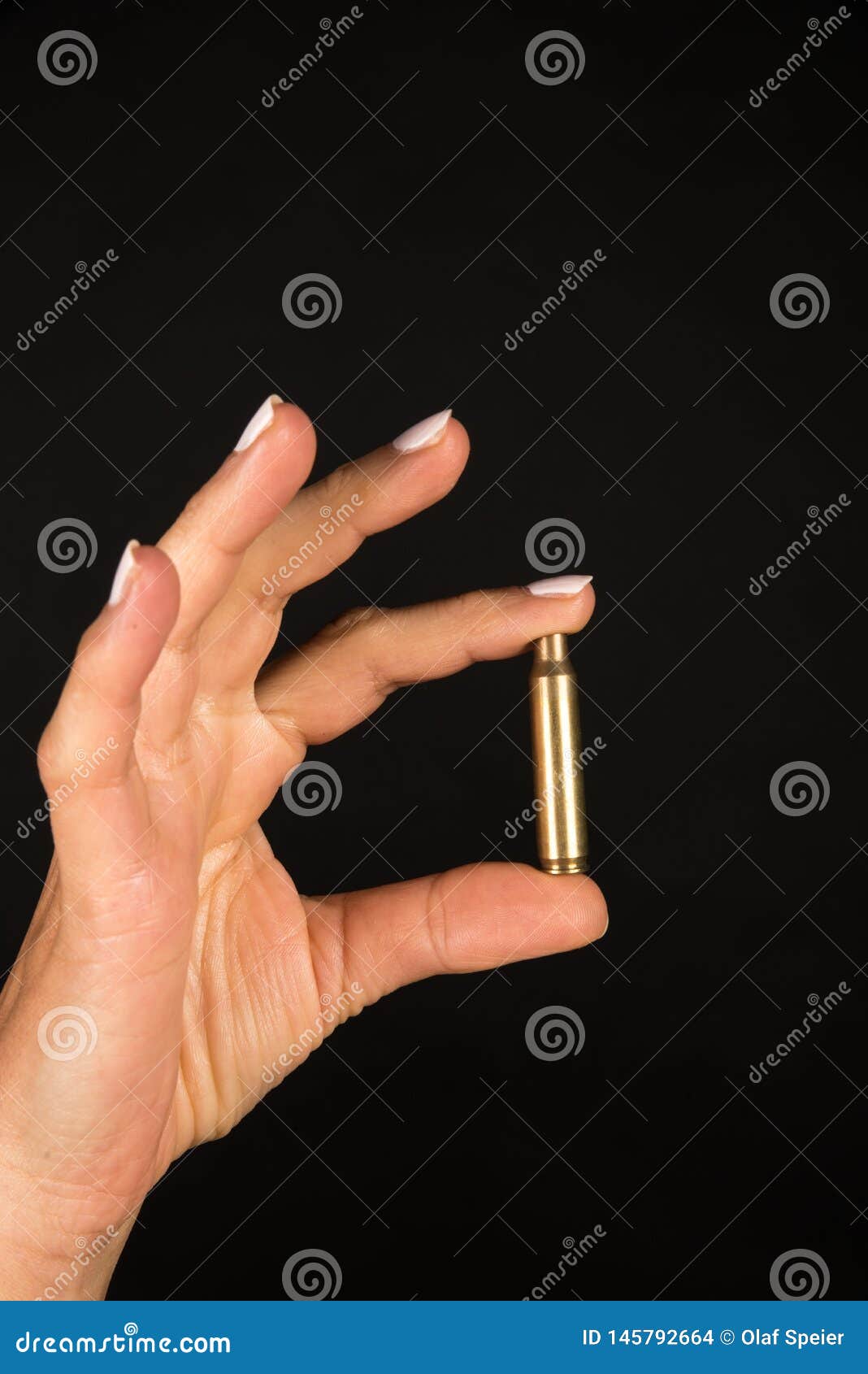 Female hand with bullets editorial stock image. Image of dangerous ...