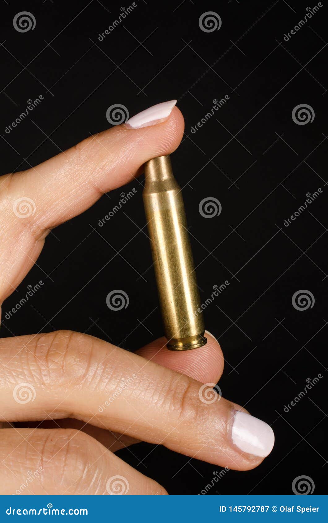 Female hand with bullets stock image. Image of studio - 145792787