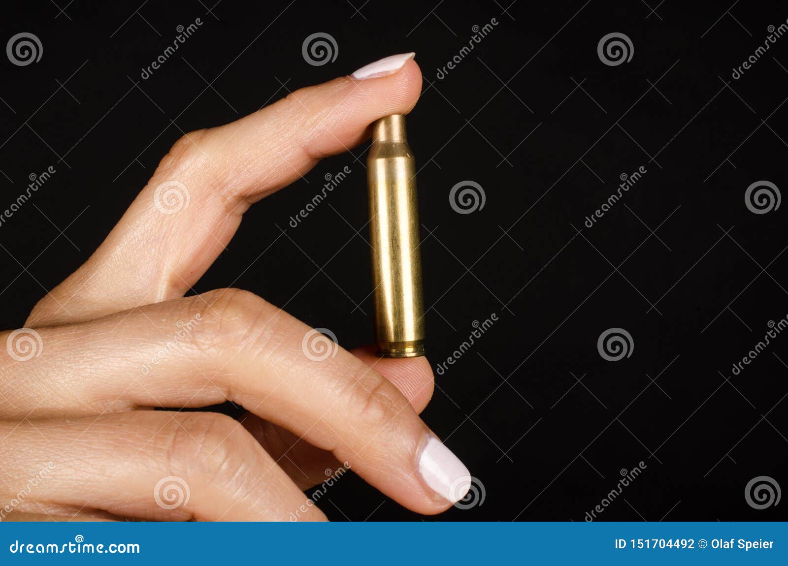 Female hand with bullets stock photo. Image of space - 151704492