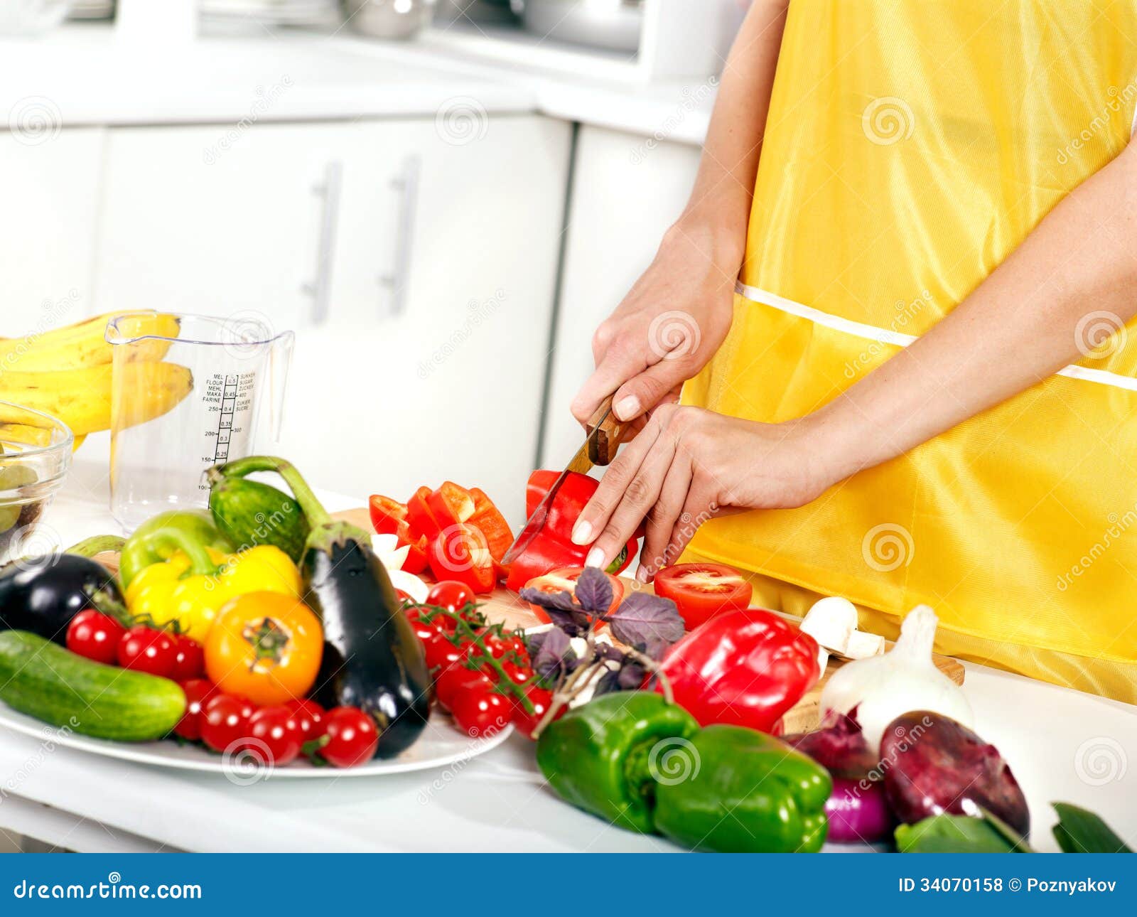 Female Hand Cutting Vegetable at Kitchen. Stock Photo - Image of person ...