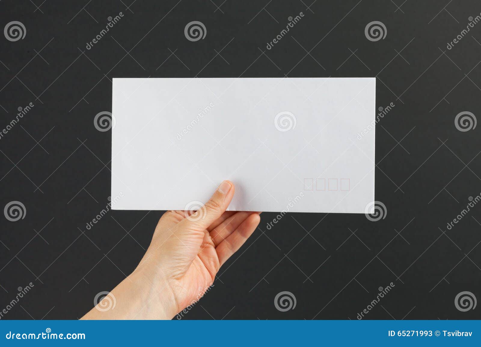 Female Hand Delivering A White Envelope On Black Background Royalty ...