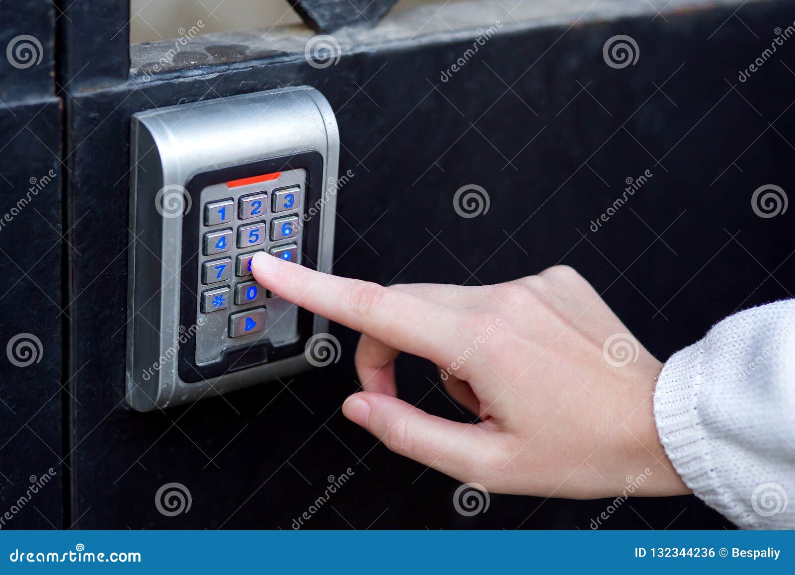 Female Hand Dials the Access Code on the Electronic Lock. Stock Photo ...