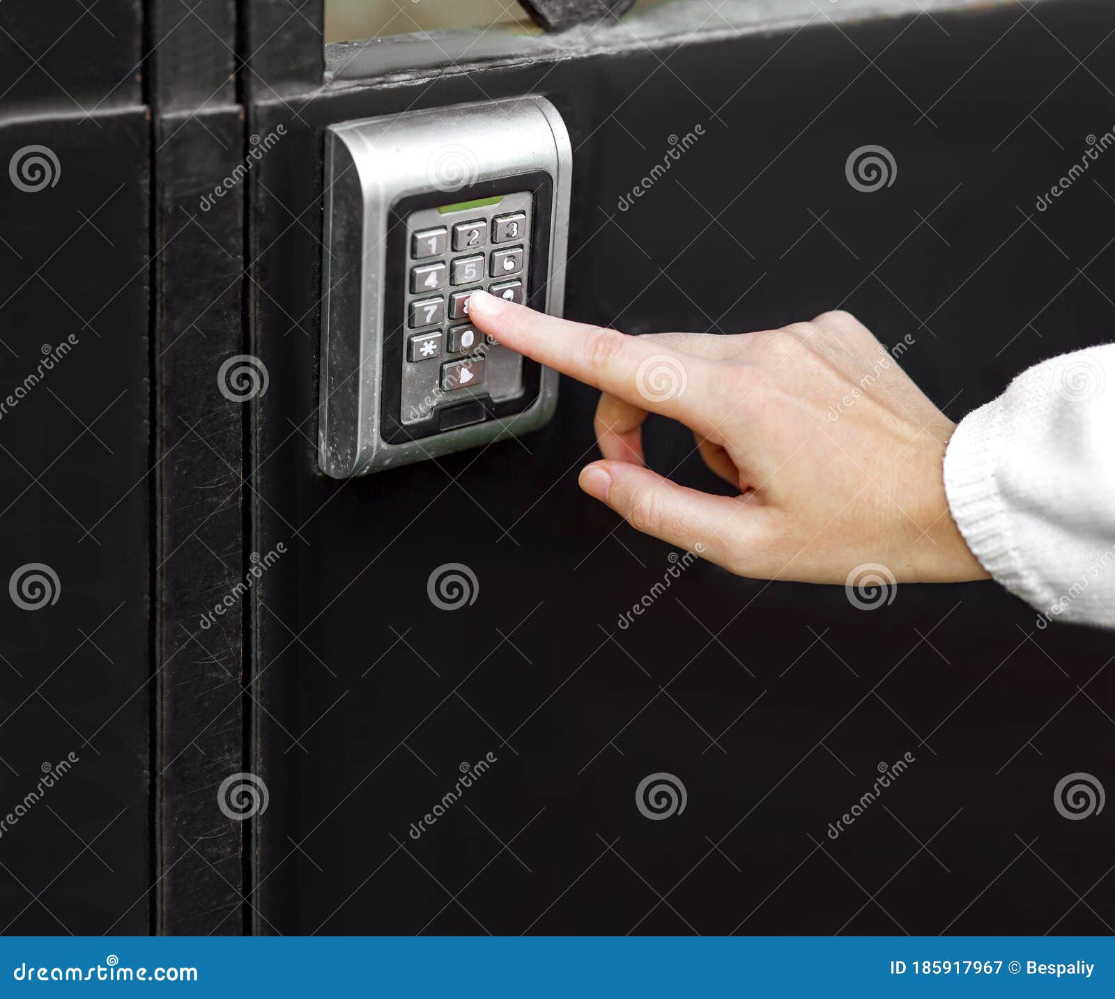 Female Hand Dials the Access Code on the Electronic Lock by Pressing a ...