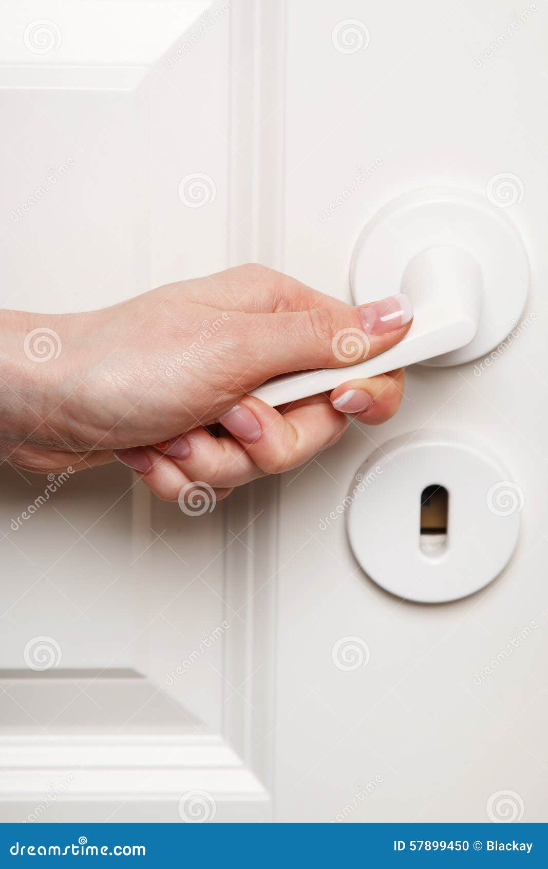 Female hand on door handle stock photo. Image of wooden - 57899450