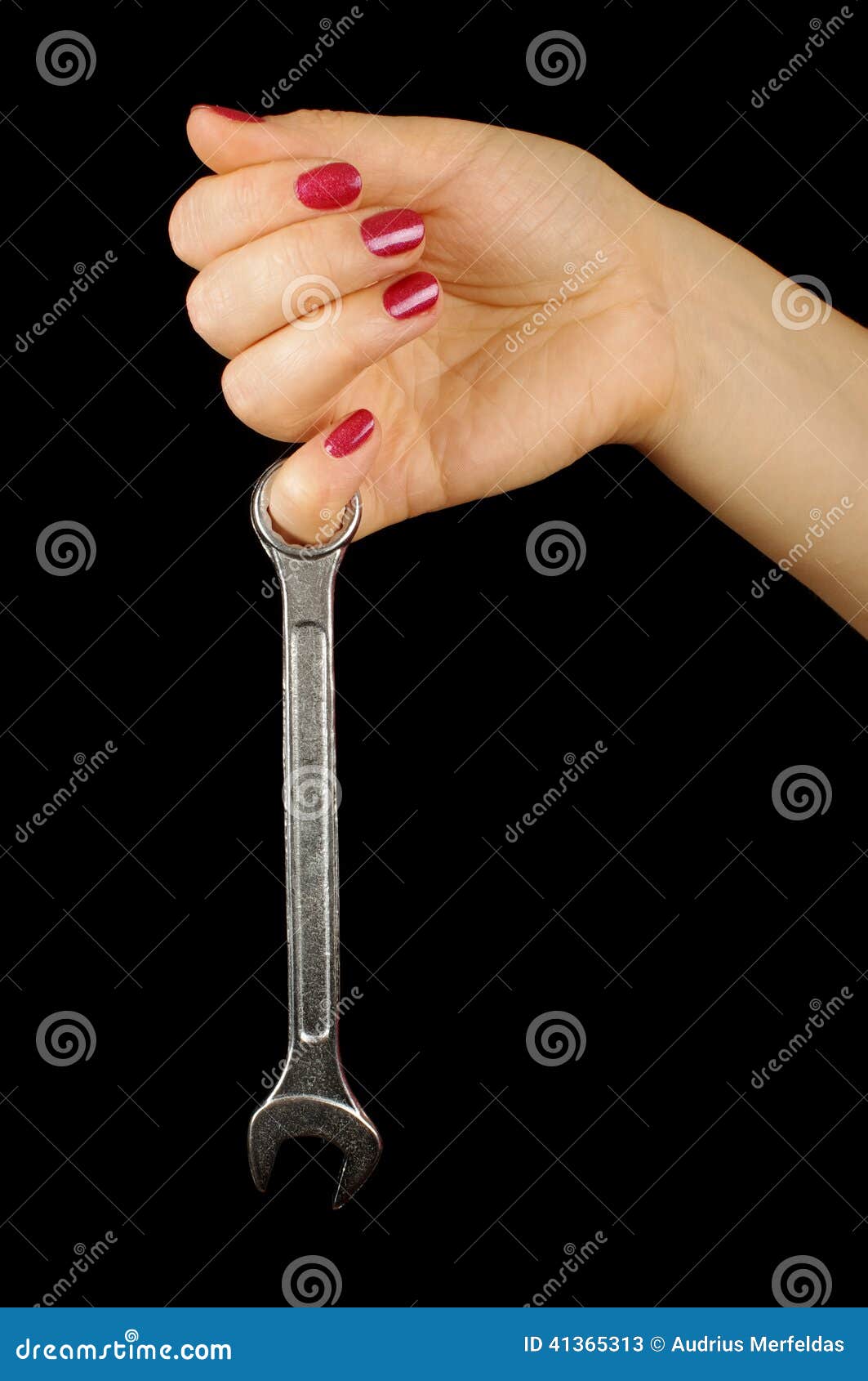 Female Hand Gently Holding Steel Wrench On The Black Background Stock ...