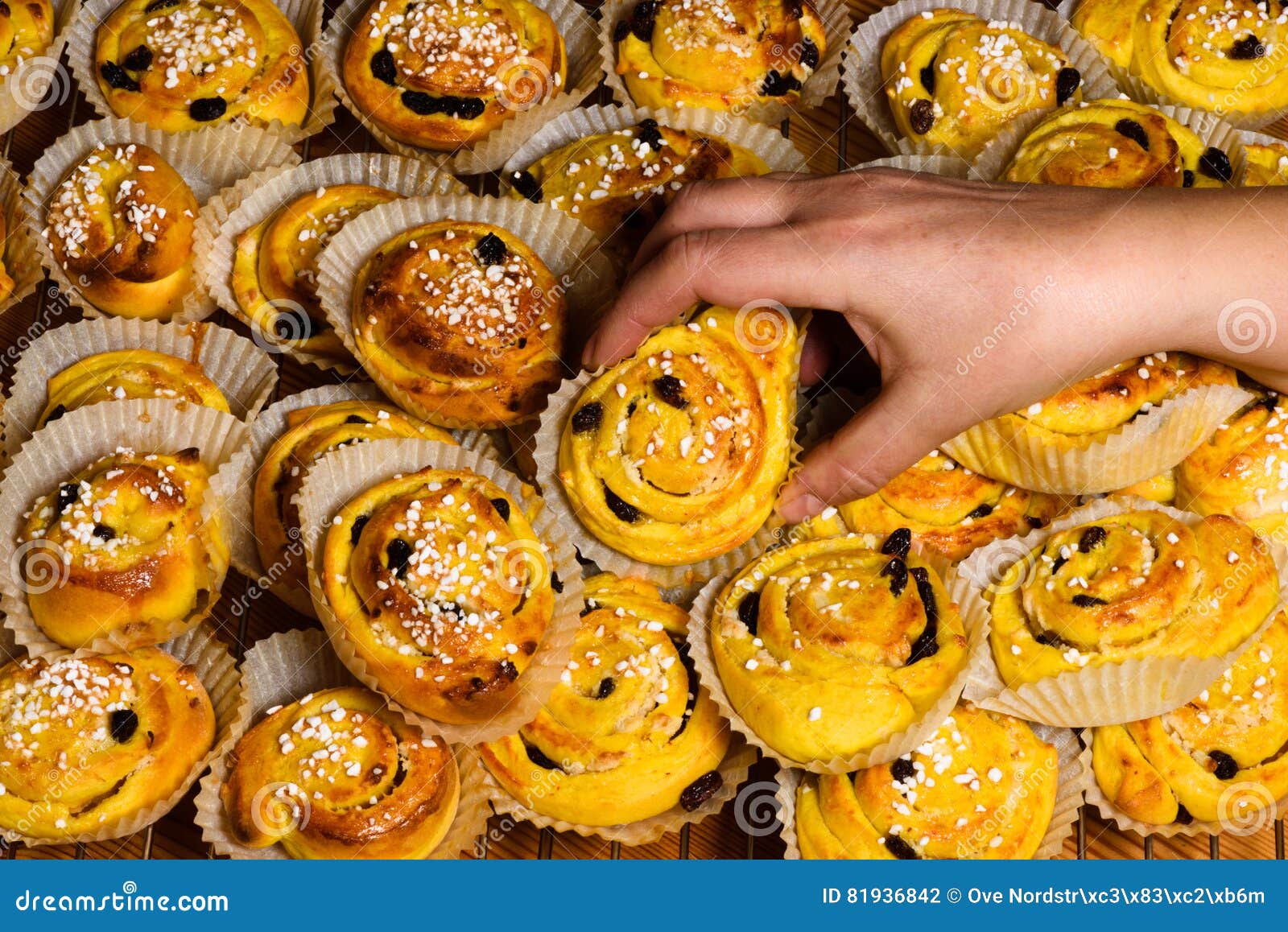 Female Hand Grabbing a Saffron Bun Stock Photo - Image of lussekatt ...