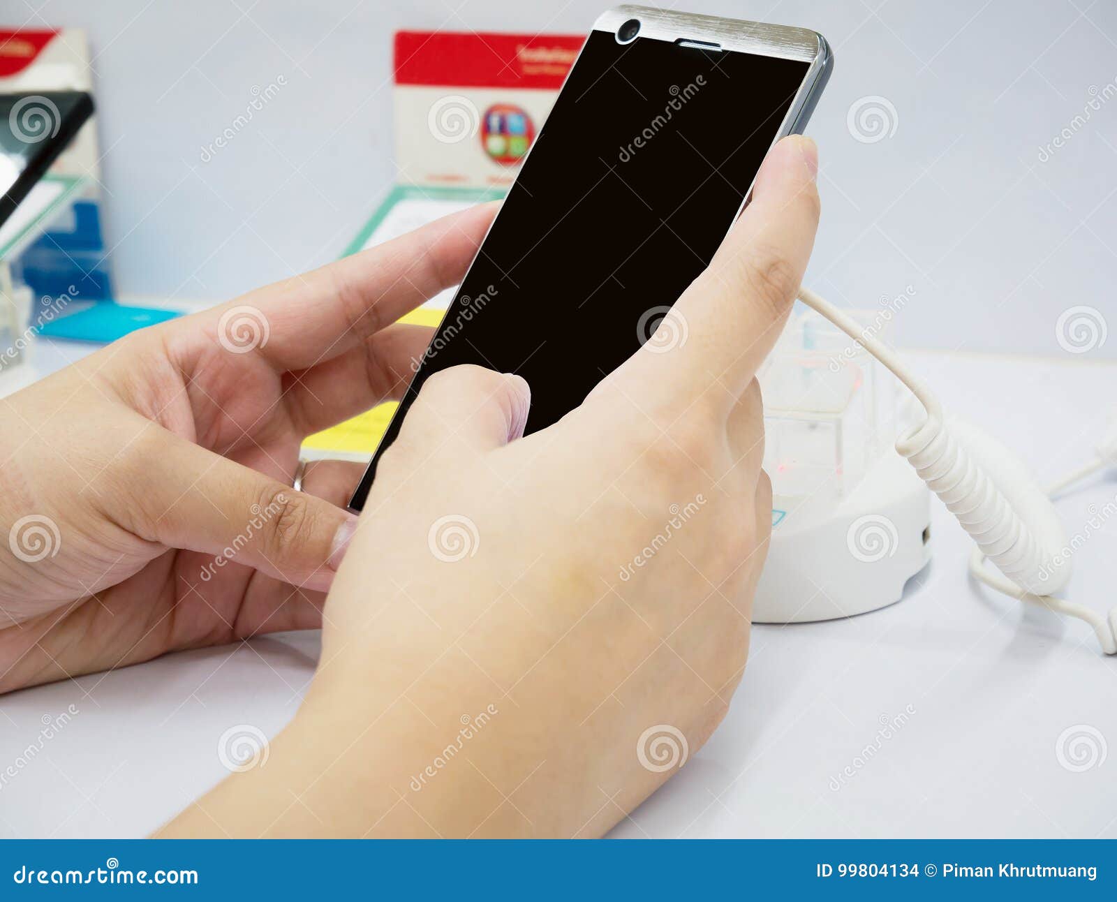 Female Hand Hold Mobile Smartphone In Mobile Phone Shop Stock Photo ... Female Hand Hold Mobile Smartphone In Mobile Phone Shop Stock Photo ...