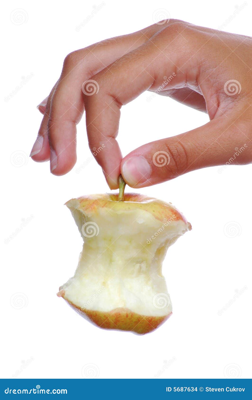 Female Hand Holding Apple Core by Stem Stock Photo - Image of organic ...