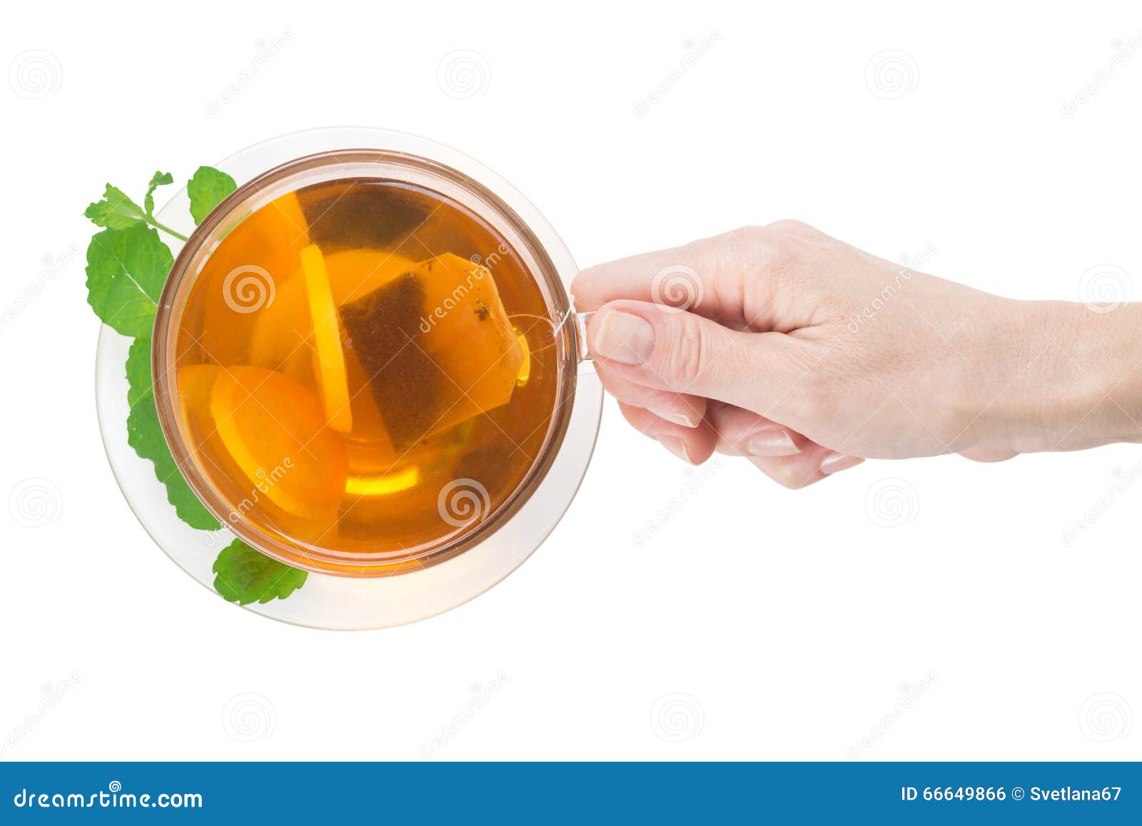 Female Hand Holding a Cup of Tea Stock Photo - Image of yellow, macro ...