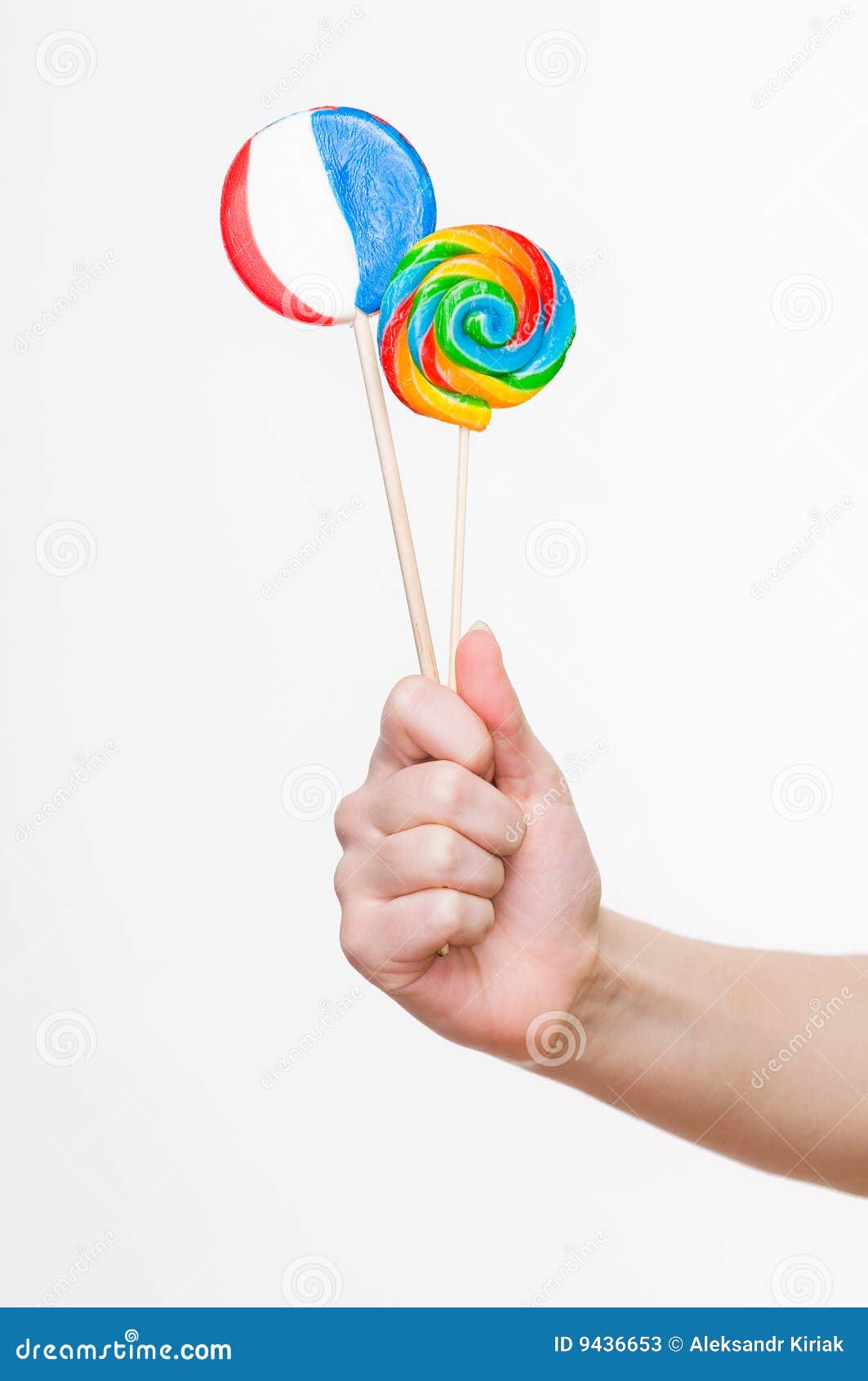 Female Hand Holding Lollipops Stock Image - Image of studio, isolated ...
