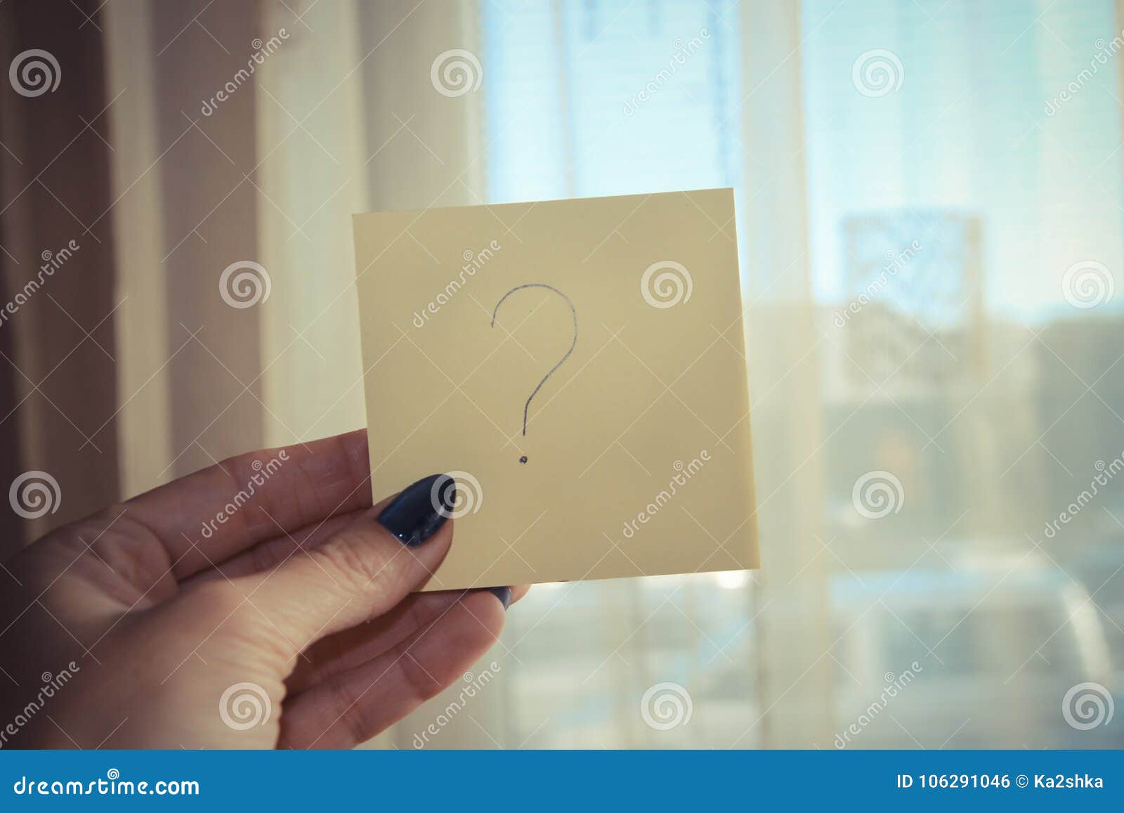 Female Hand Holding Notepad with Question Marks. Stock Photo - Image of ...